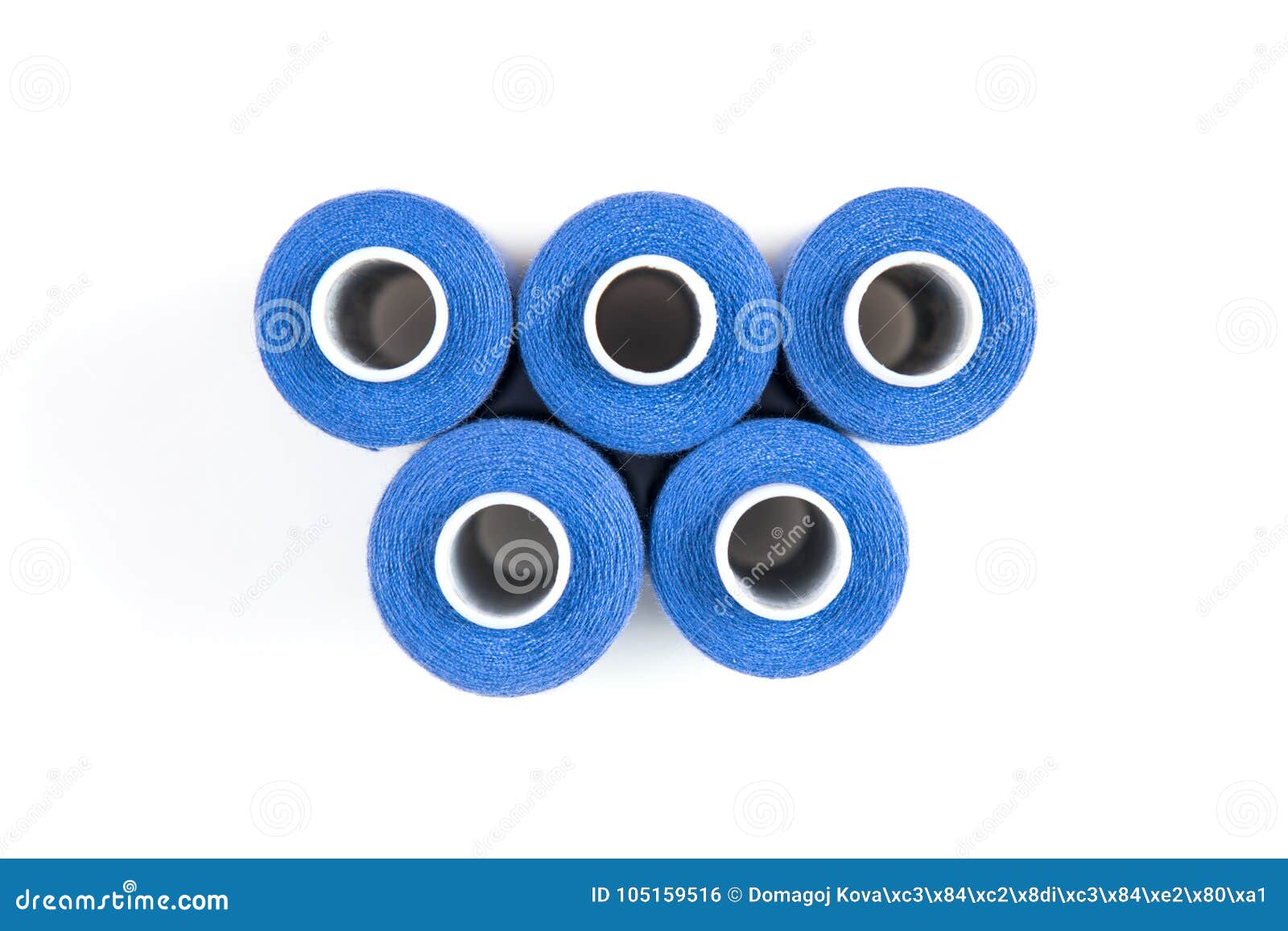 Five Blue Sewing Threads on a White Coils on a White Background. Sewing ...