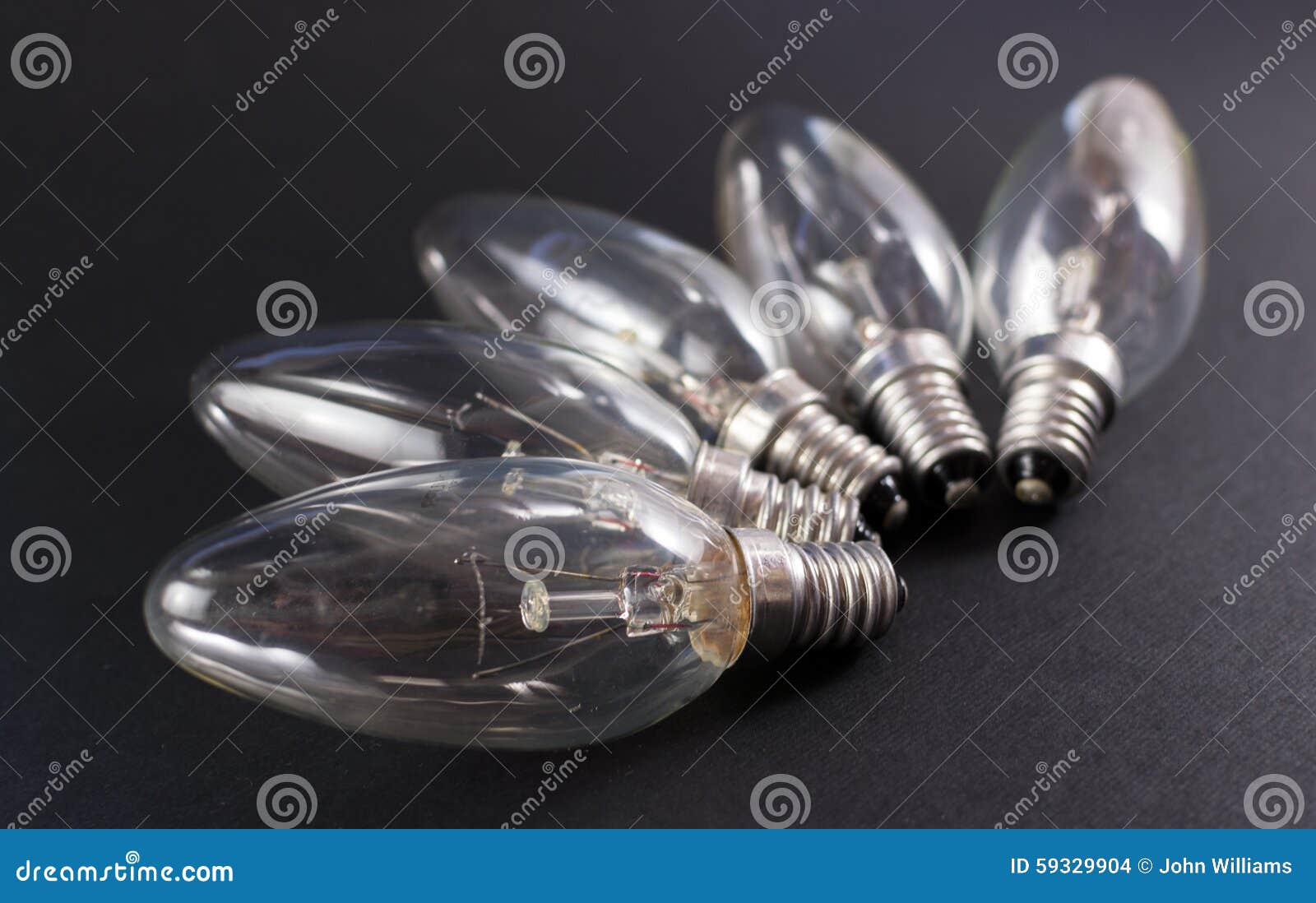 Five Broken Lightbulbs on Black Background Stock Photo - Image of ...