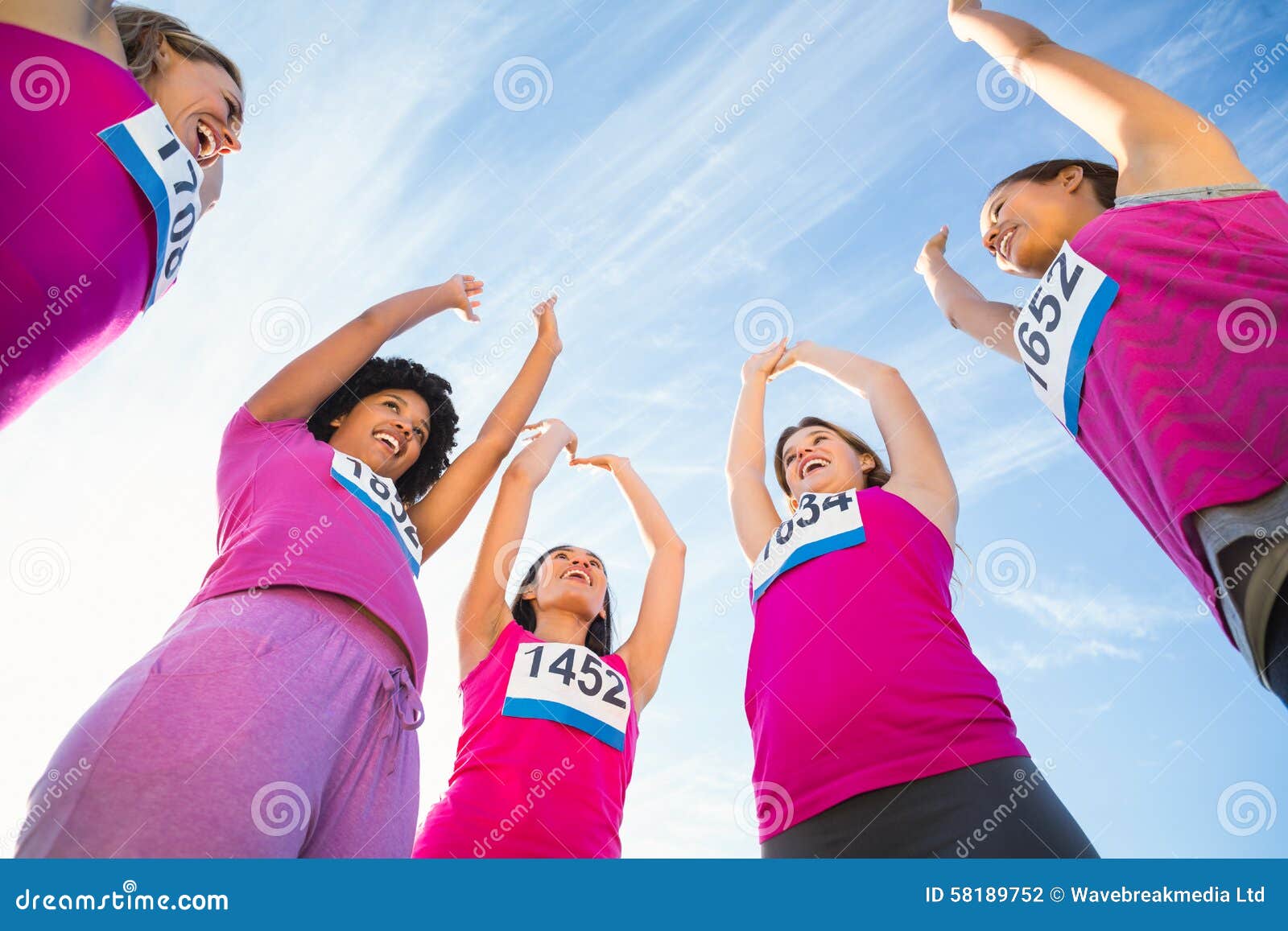Five Cheering Runners Supporting Breast Cancer Marathon Stock Photo ...