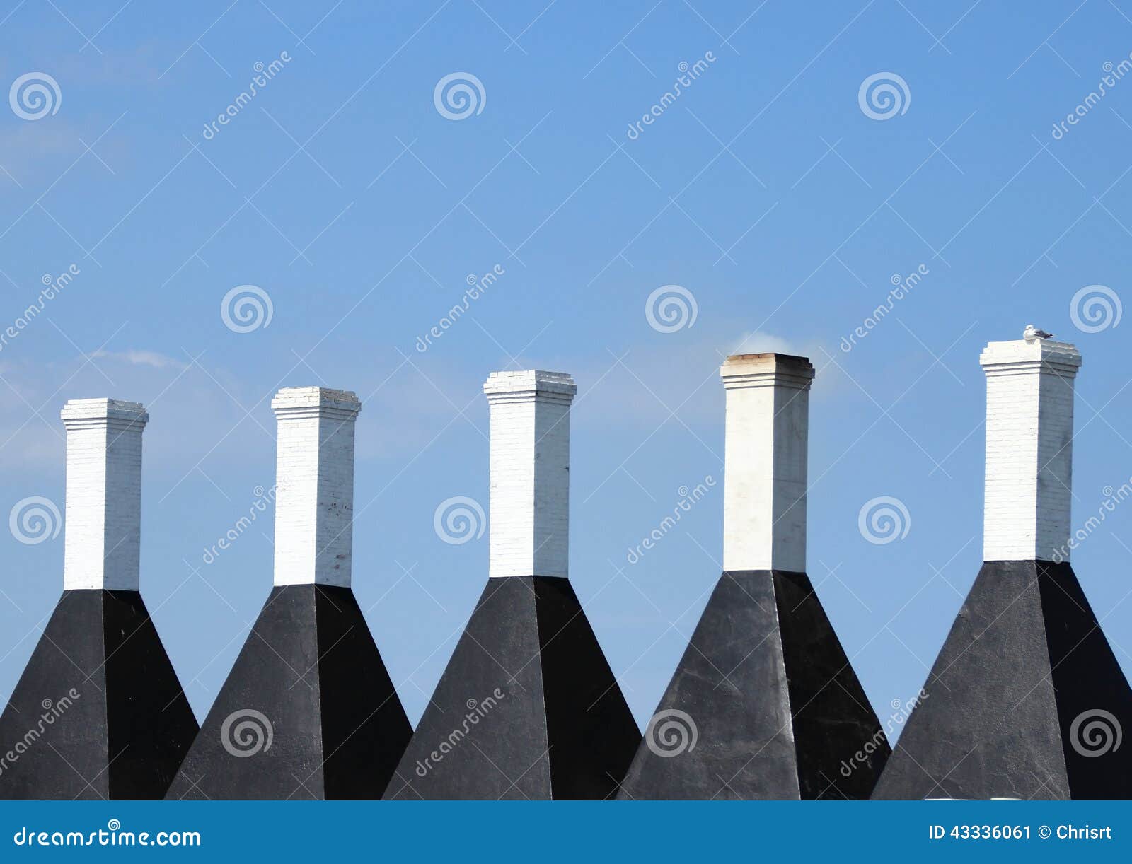 Five Chimneys on a Smokehouse with Blue Sky Stock Image - Image of ...