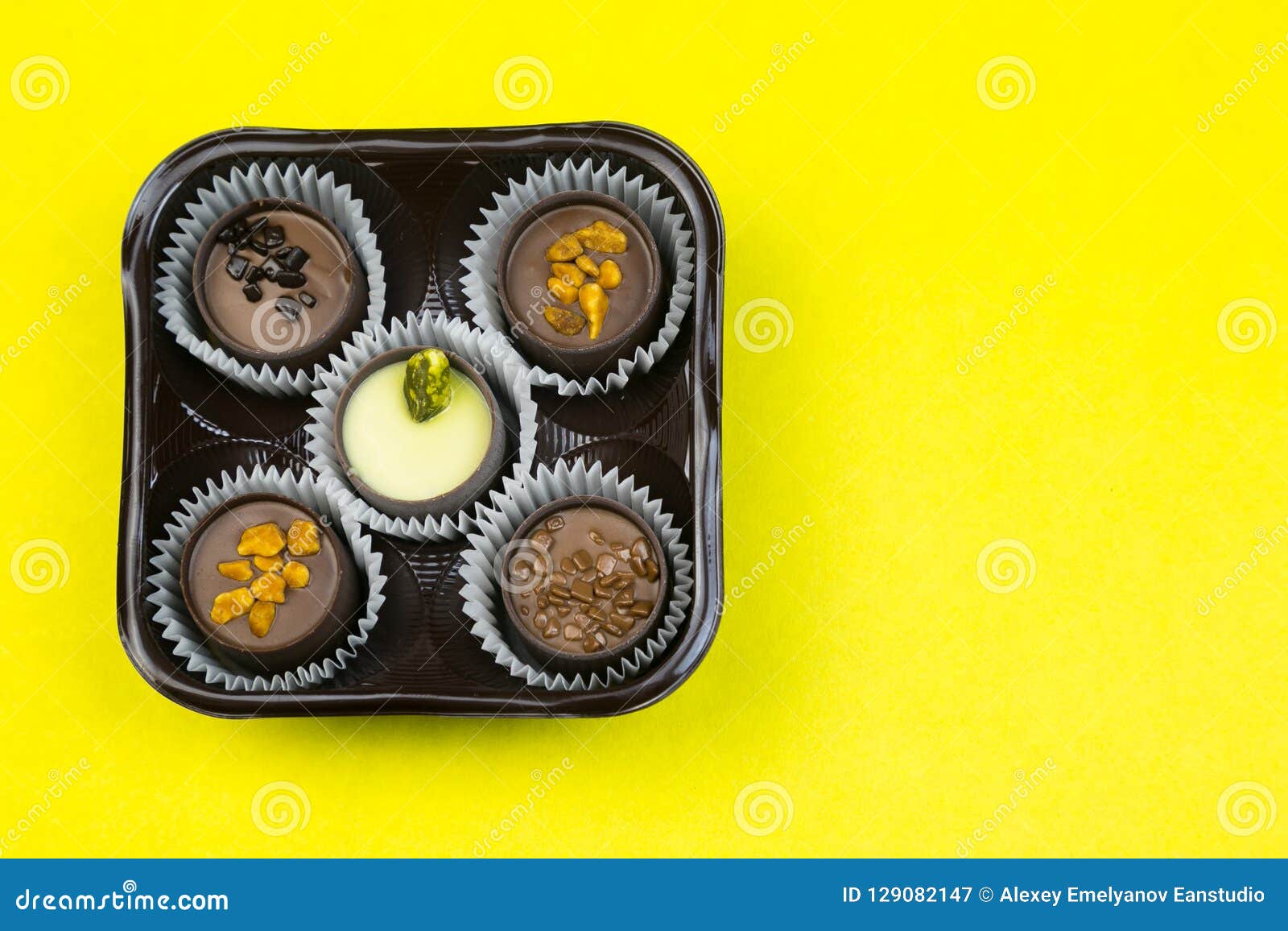 Five Chocolates on a Colored Background. Stock Image - Image of cocao ...