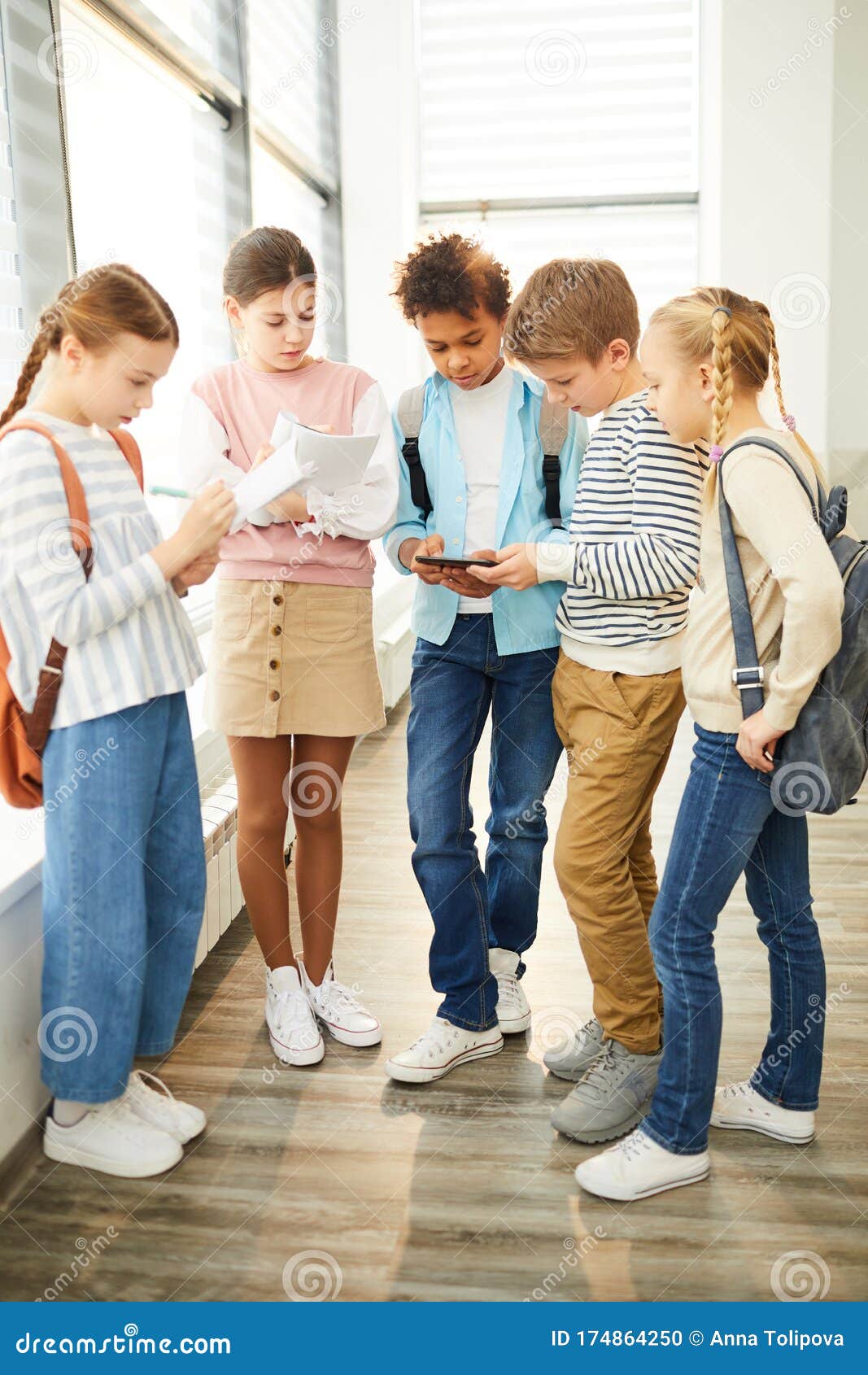 Five Classmates Talking about Homework Stock Photo - Image of ...