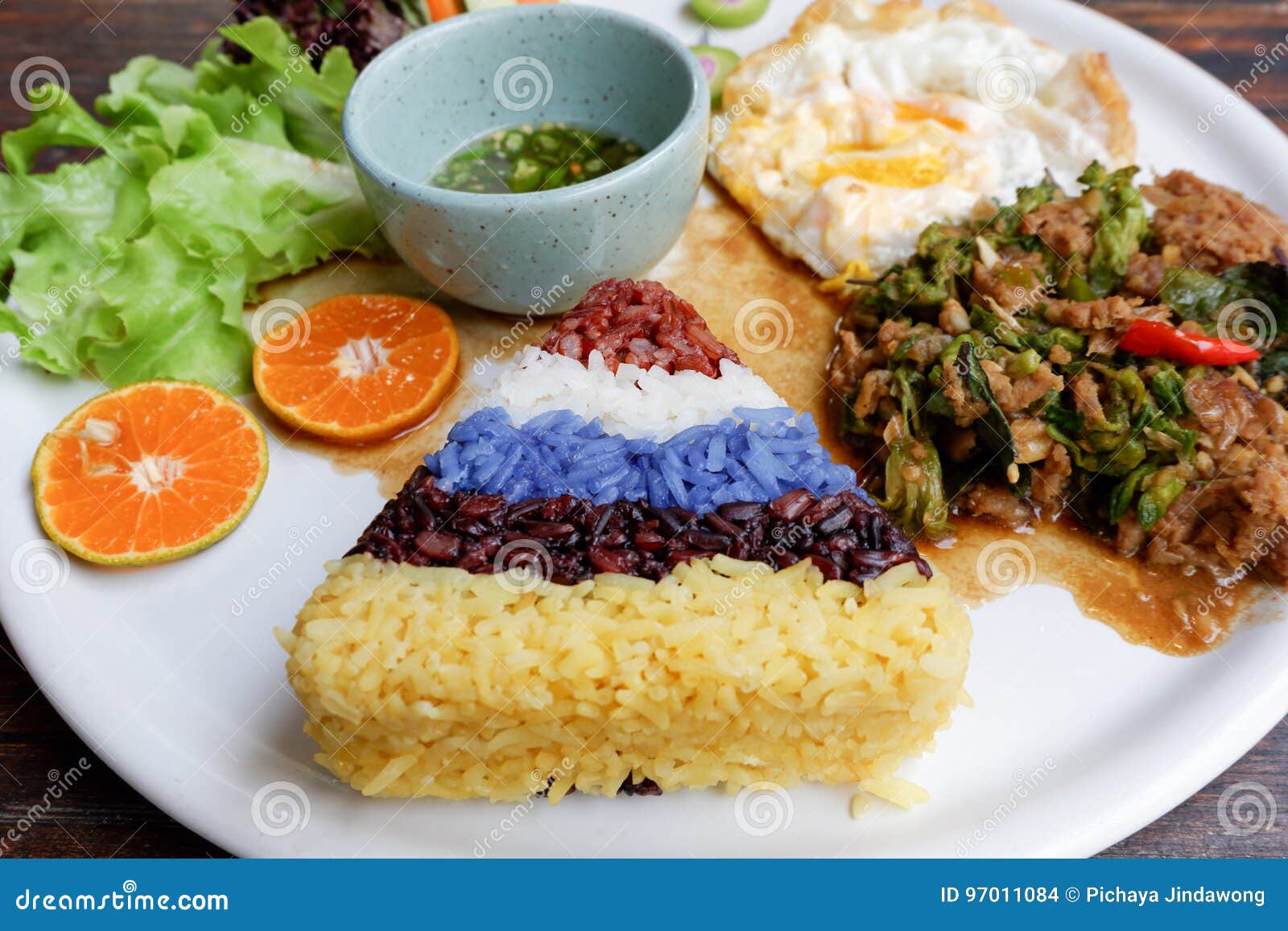 Five Color Rice with Stir Fried Pork and Basil Stock Photo - Image of ...