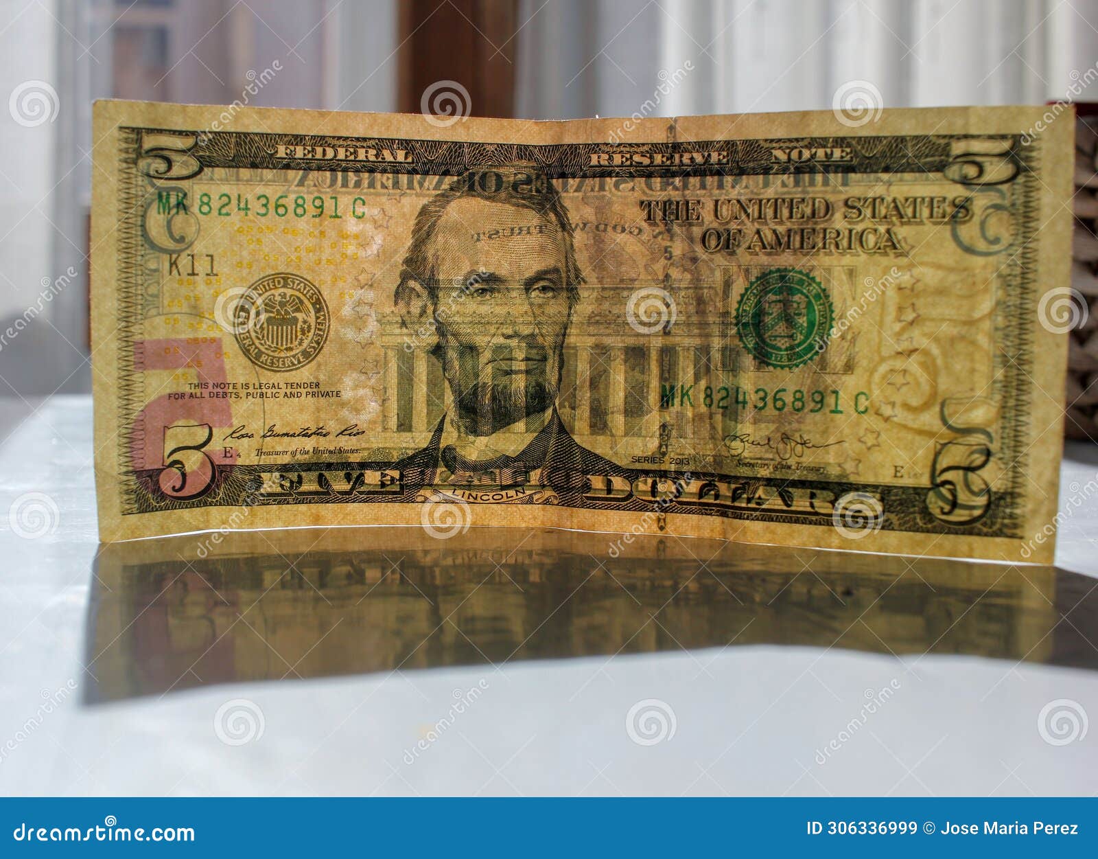 A five dollar bank note stock image. Image of wealth - 306336999