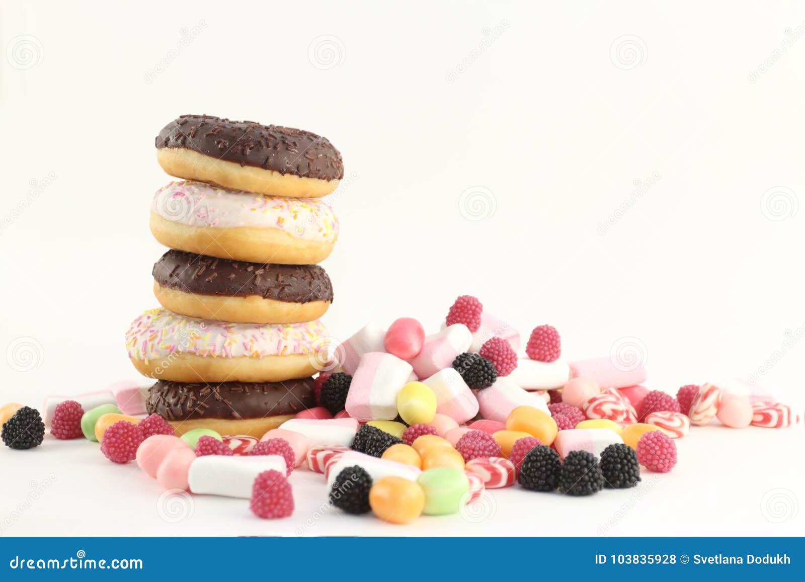 Five Donuts, Bright Candies and Marshmallows Stock Photo - Image of ...