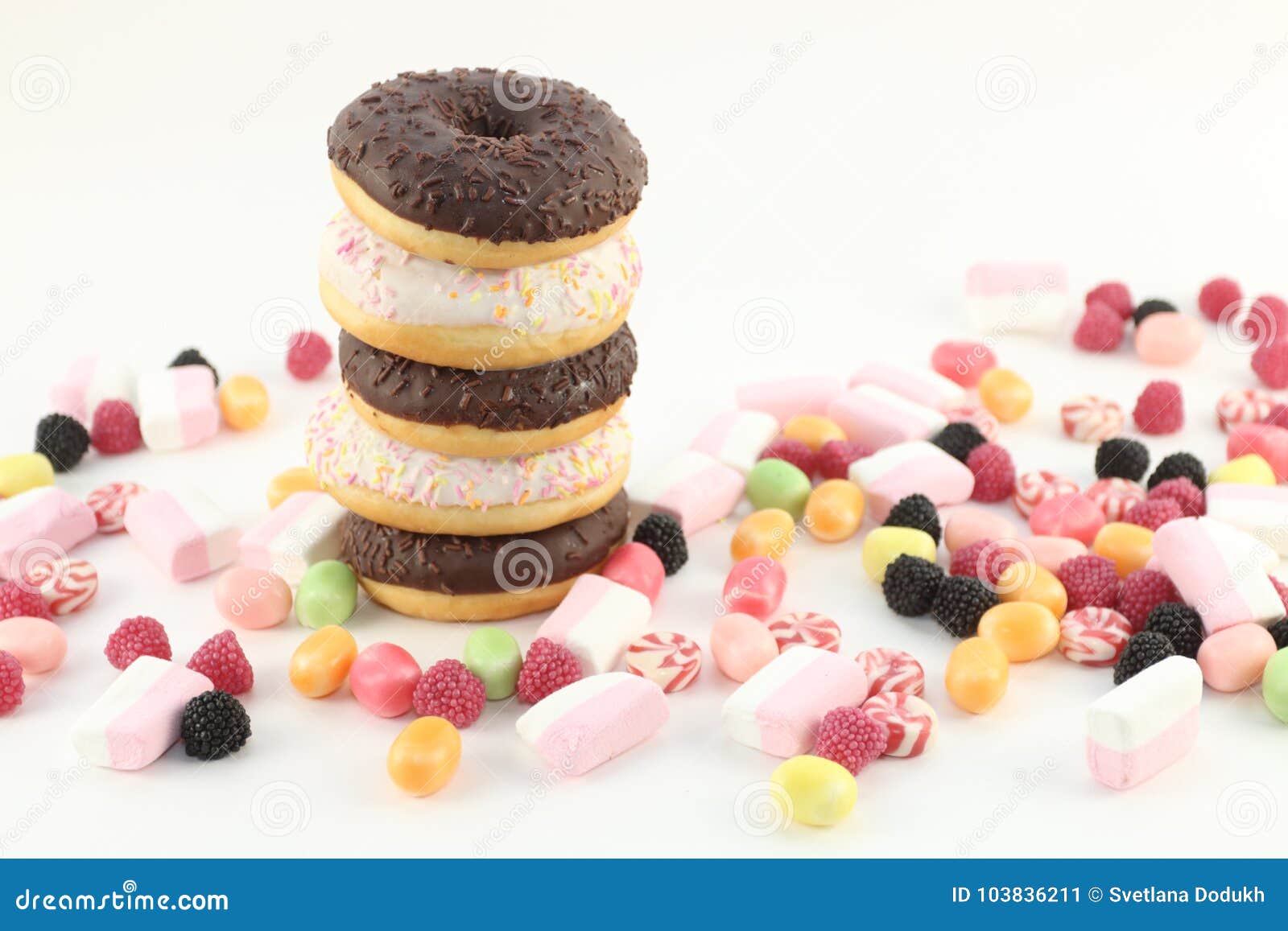 Five Donuts, Many Bright Candies and Marshmallows Stock Image - Image ...