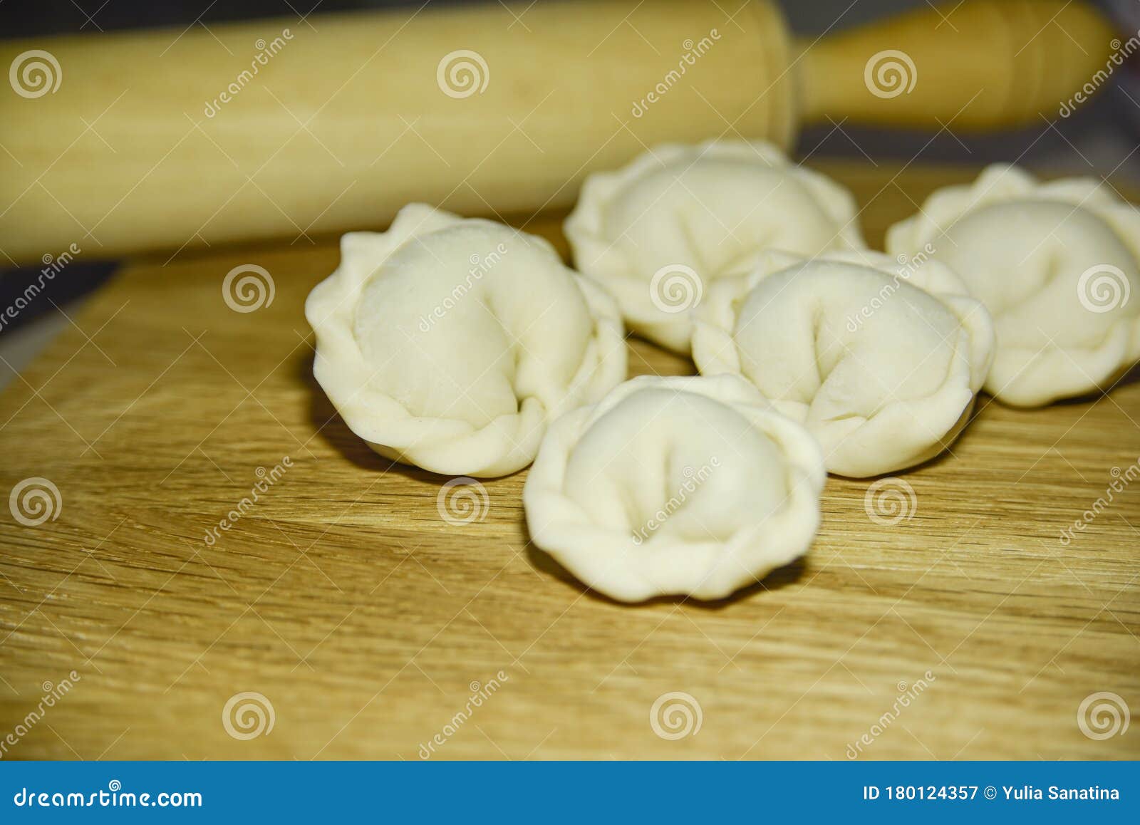 Five Dumplings of Round Shape on the Wooden Deck Stock Image - Image of ...