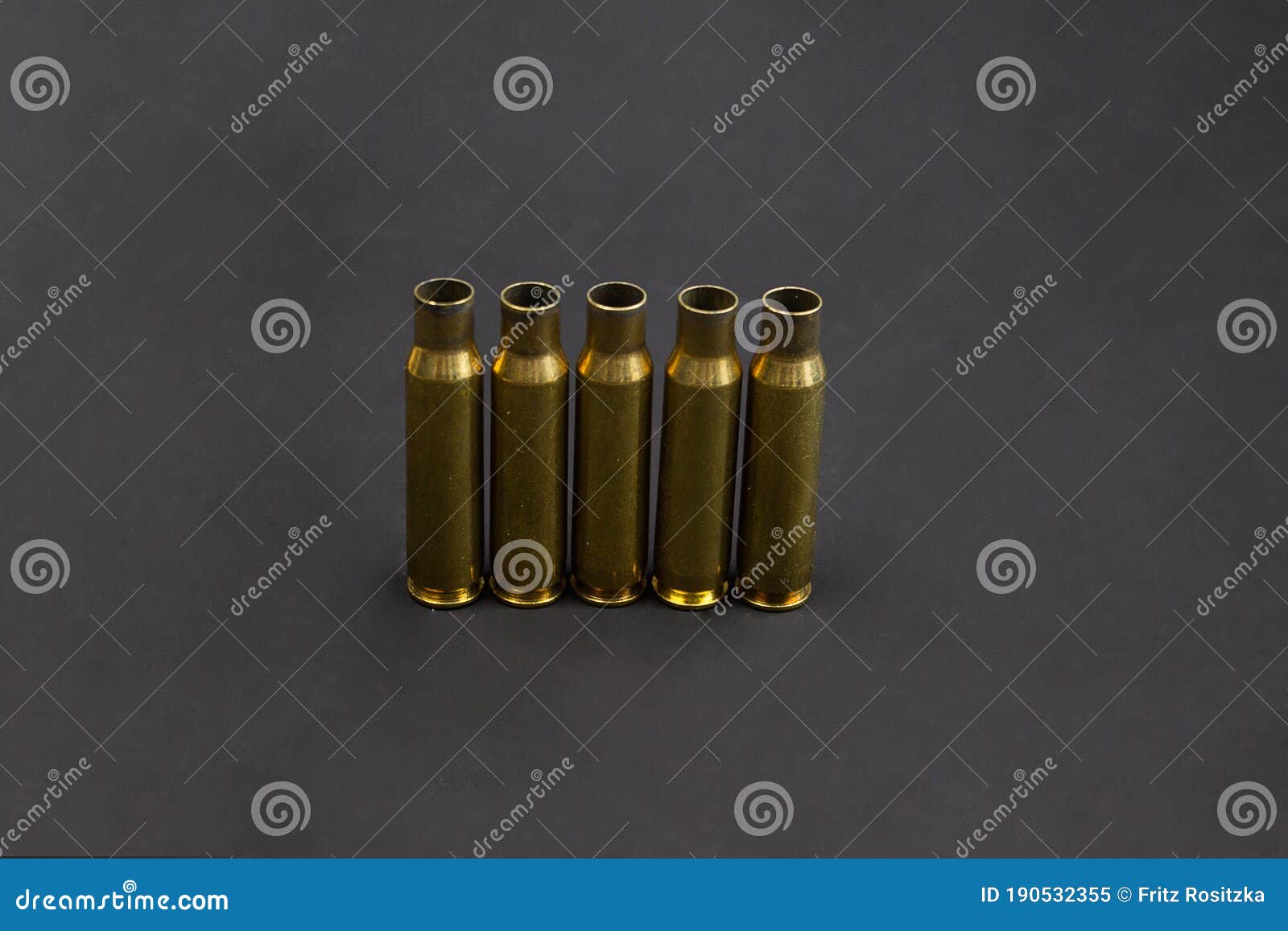 Five Empty Cartridge Cases Side by Side. Stock Image - Image of ...