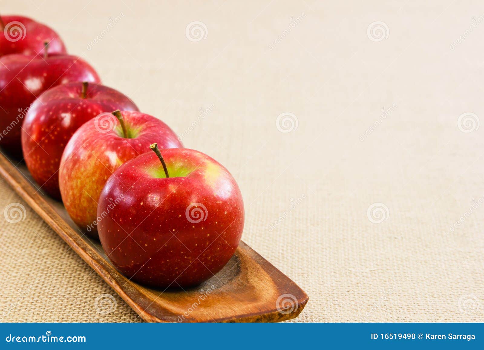 Five Fresh Red Apples Lined Up on a Wooden Tray Stock Photo - Image of ...