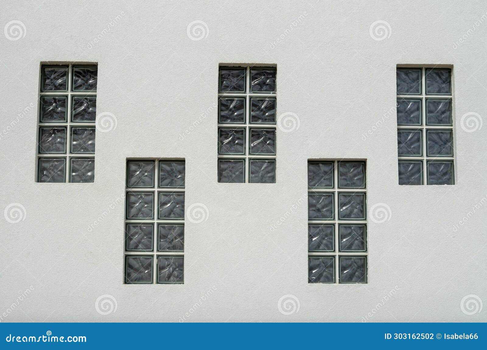 Five Glass Brick Windows on White Wall Closeup Stock Photo - Image of ...
