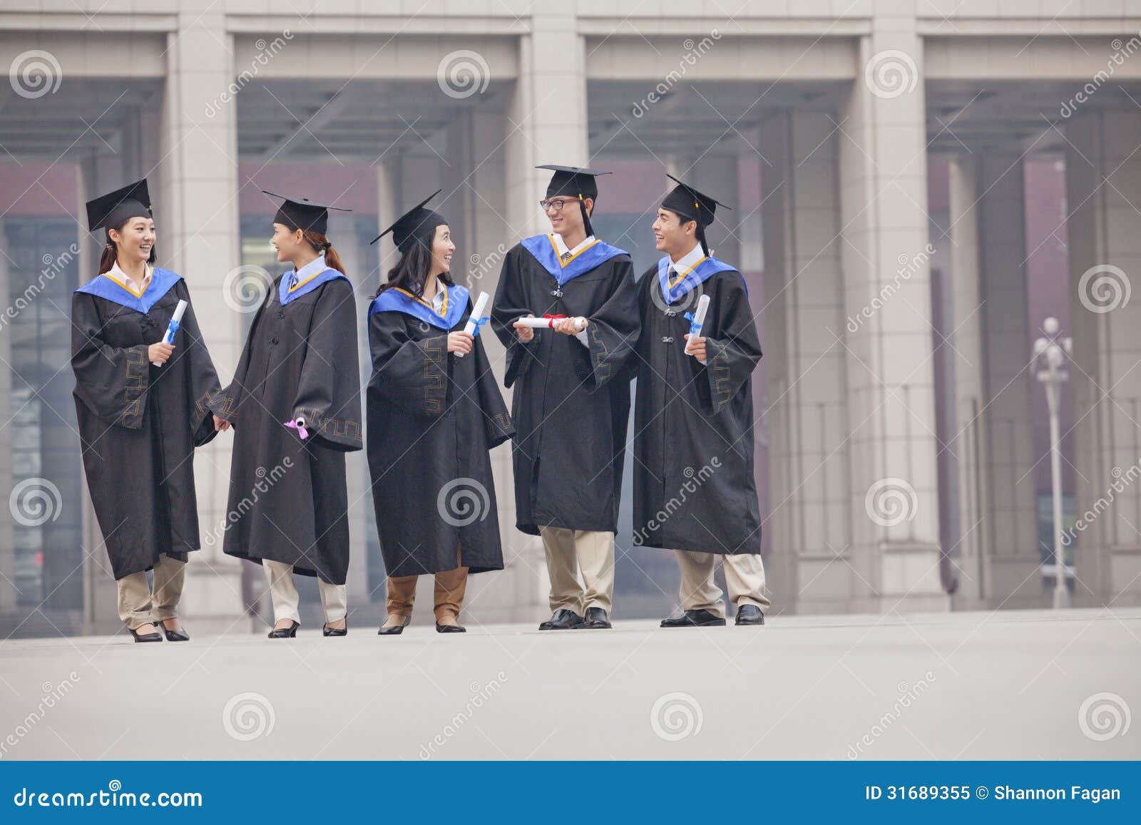 Five Graduate Students Standing and Talking with Diplomas Stock Image ...
