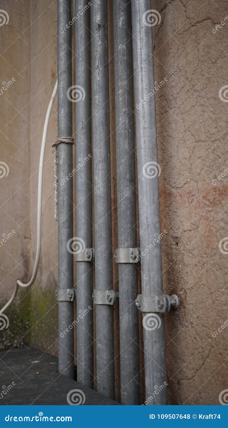 Piping pipes on the wall stock photo. Image of detail - 109507648