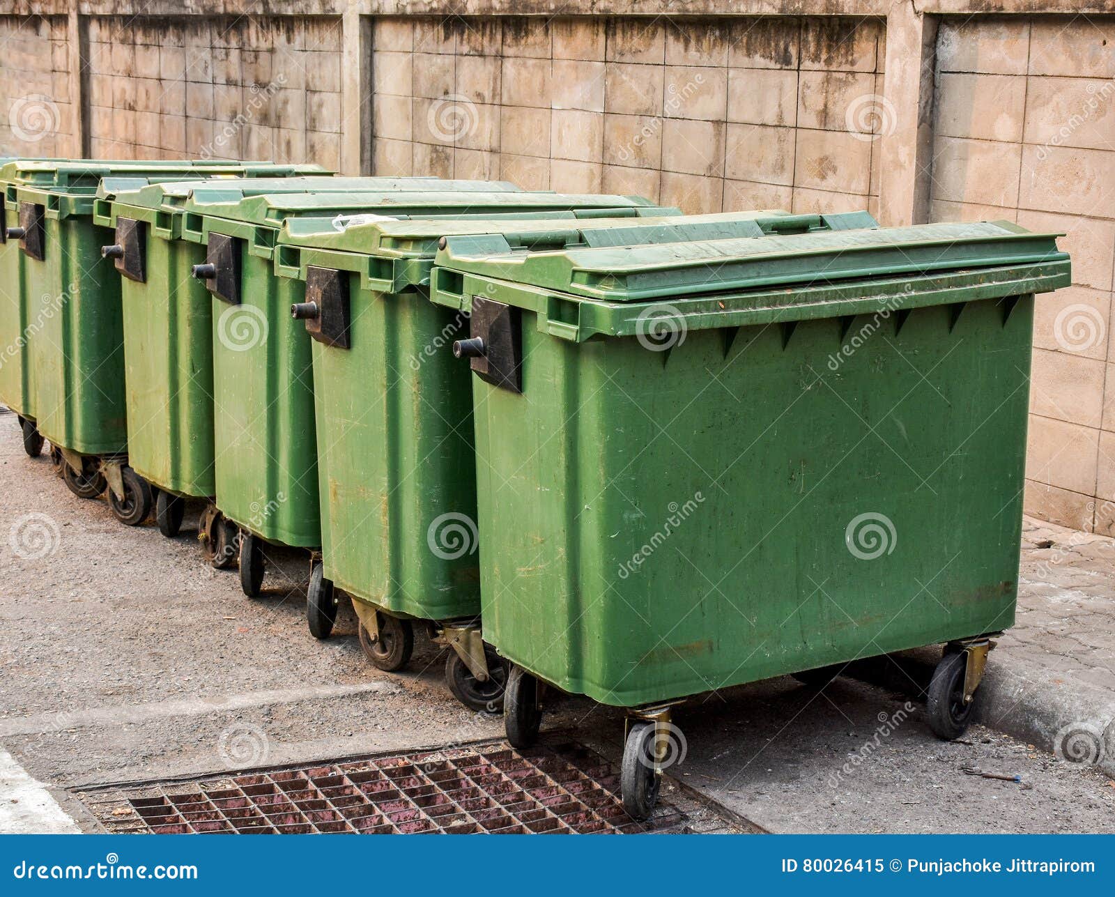 Five Green Trash Bins on Rollers Stock Image - Image of large, stack ...
