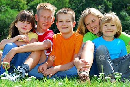 Five happy children stock image. Image of grass, happily - 3013009