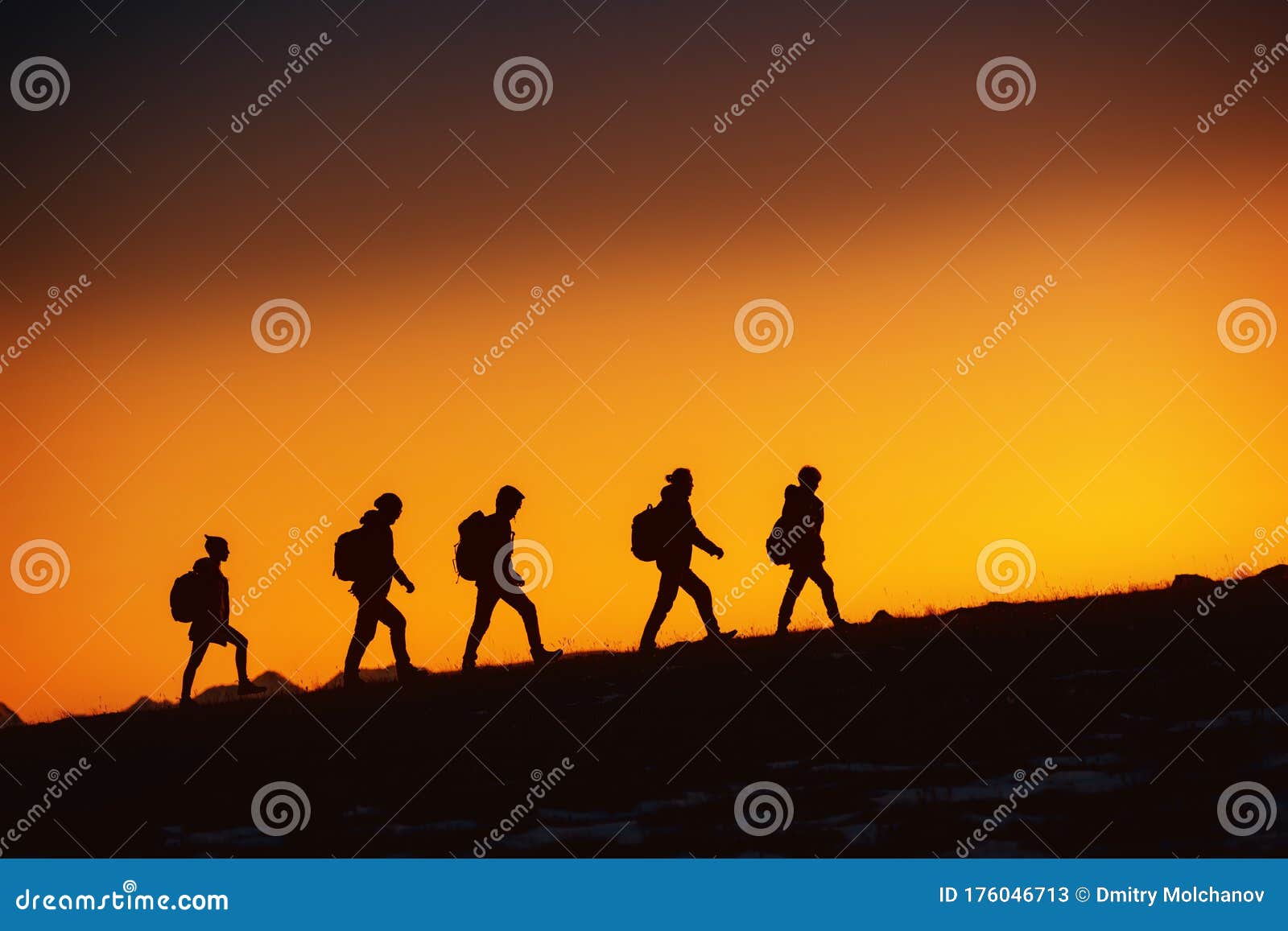 Five Hikers Going Uphill at Sunset Stock Image - Image of hiker ...