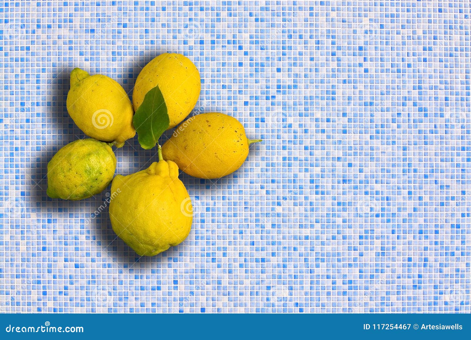 Five Lemons on Blue Mosaic Wall Stock Image - Image of destinations ...