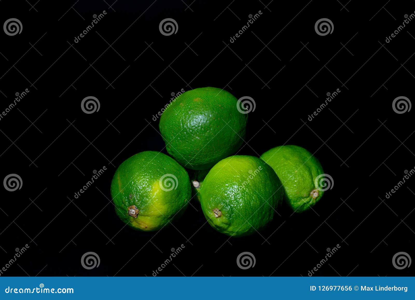 Five limes in a pile stock photo. Image of composition - 126977656