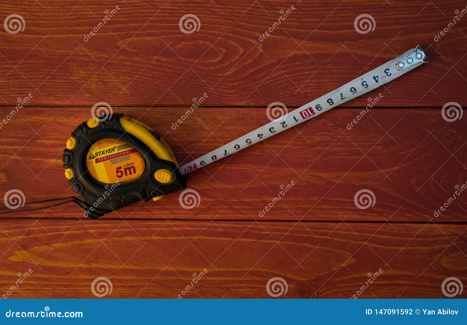 Five Meter Working Tape on Wooden Background Editorial Photography ...