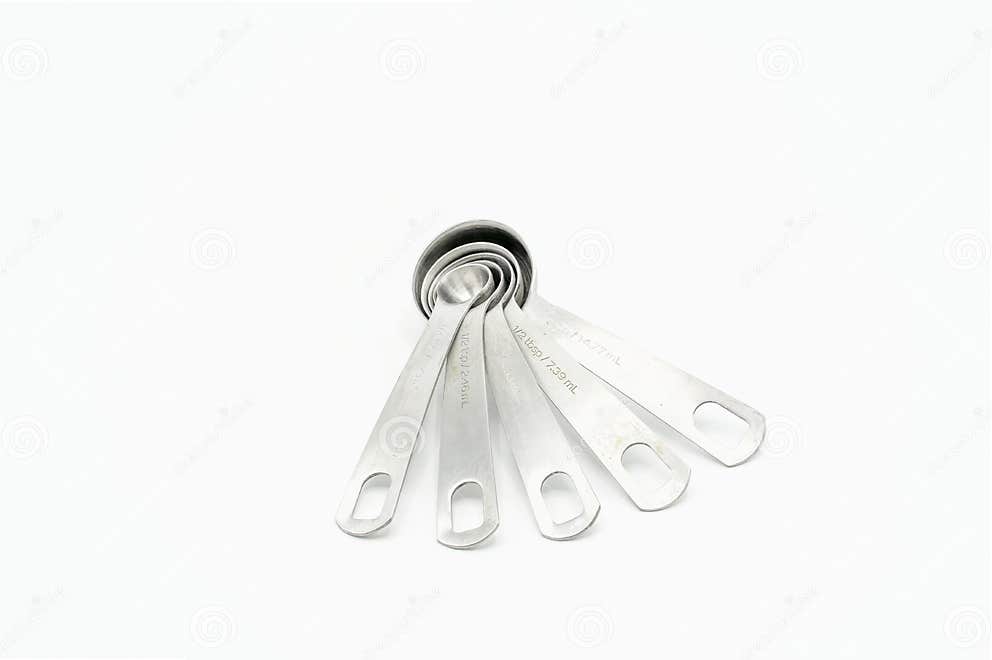 Five Piece Set of Measuring Spoons on White Stock Image - Image of ...