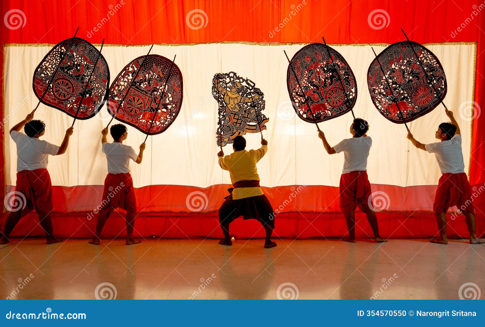 Five Player Men Stand with Perform Grand Shadow Play in Front of White ...