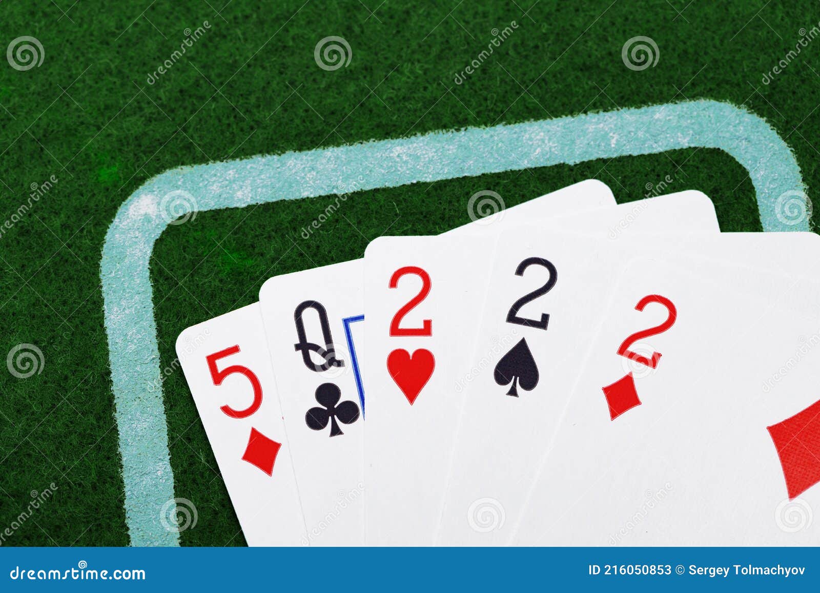 Five Playing Cards on Green Textile Background Top View Stock Image ...