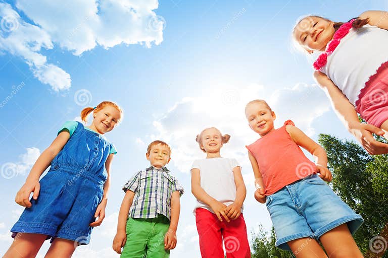 Five Pretty Children Looking Down at the Camera Stock Photo - Image of ...