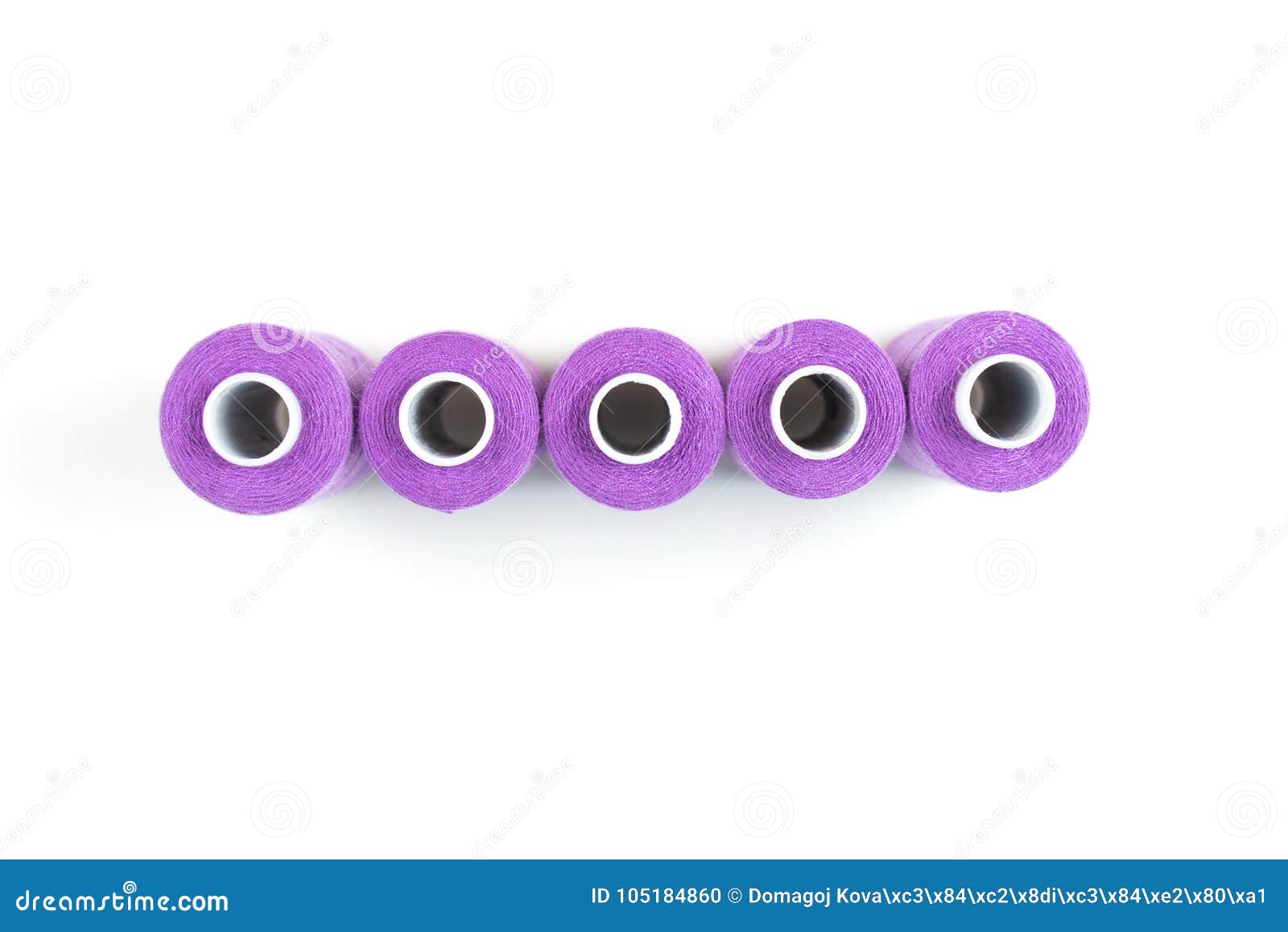 Five Purple Sewing Threads in a Row on a White Background, Top View ...