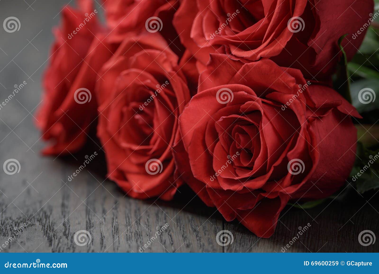 Five Red Roses on Wooden Table Stock Image - Image of card, birthday ...