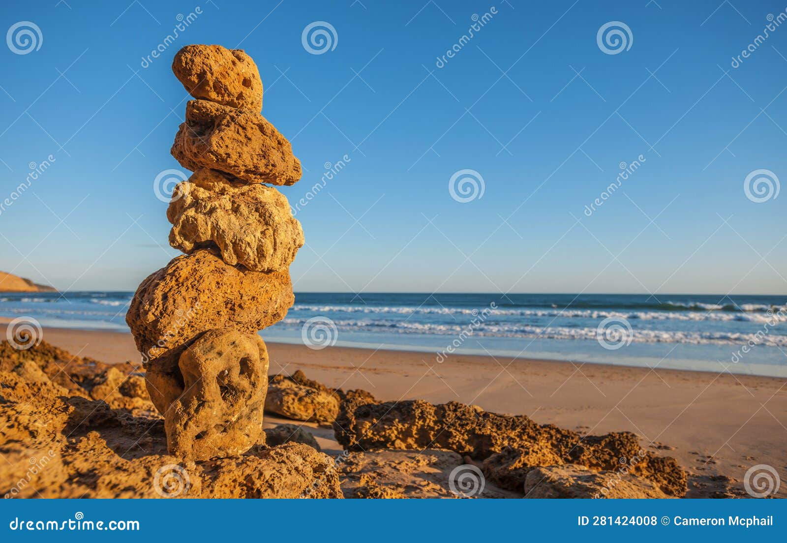 Column of Five Rocks Placed Atop Each Other Stock Photo - Image of rock ...