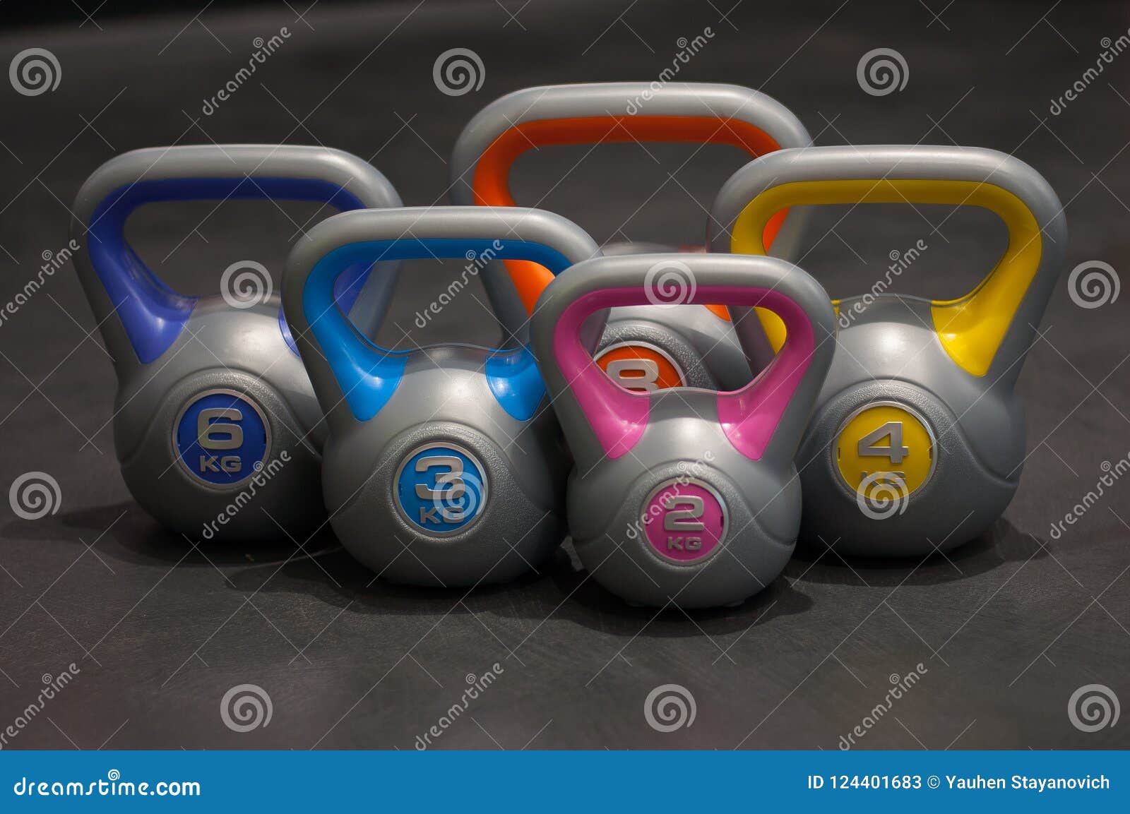 Five Several Plastic Weights of Different Weights and Colors Stock ...