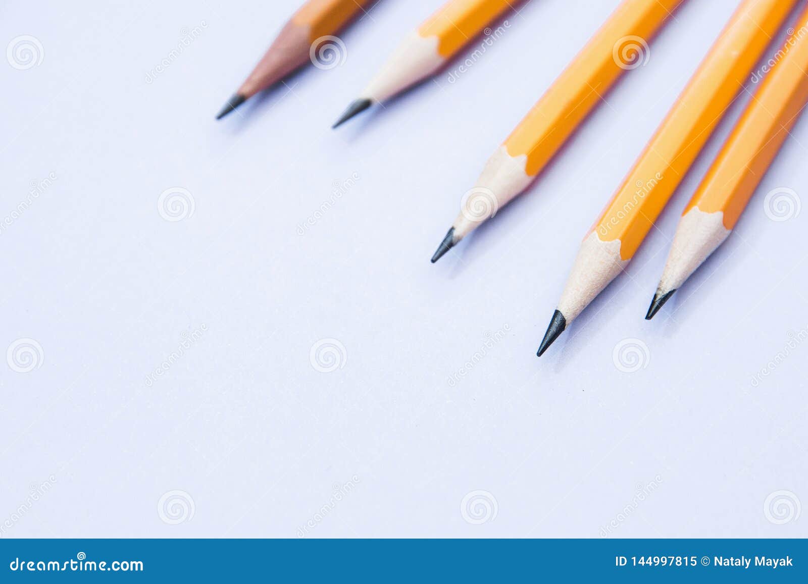 Five Simple Pencils on a Lilac Background with a Copy Space. Selective ...