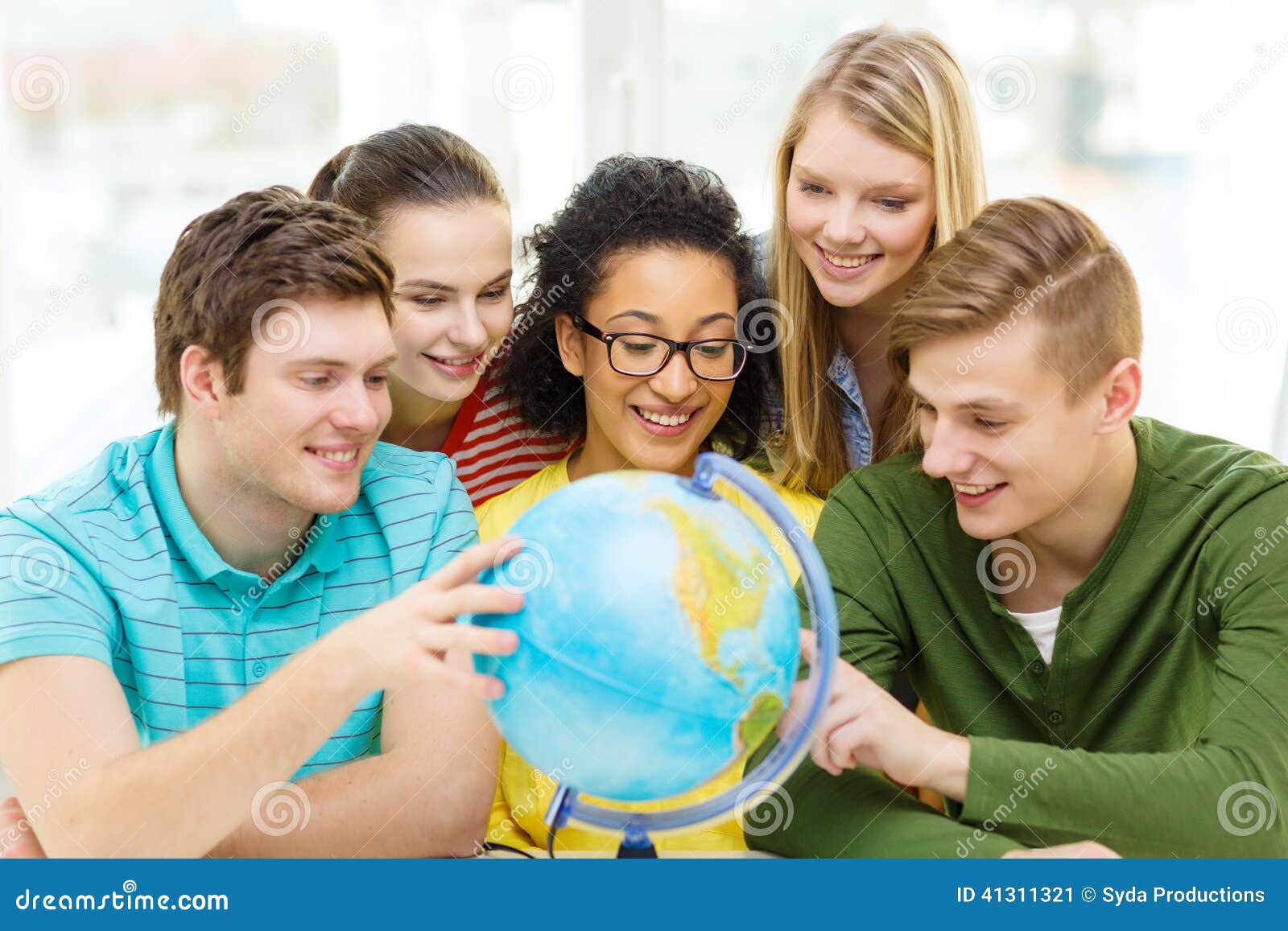 Five Smiling Student Looking at Globe at School Stock Image - Image of ...