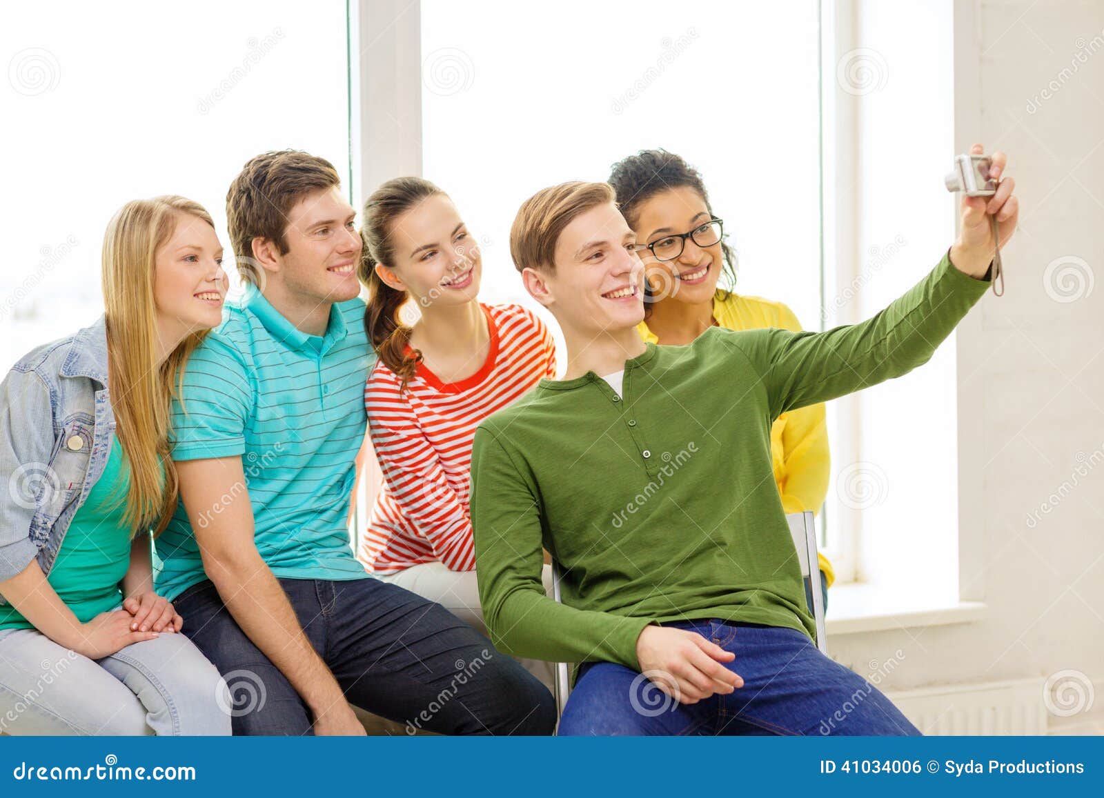 Five Smiling Students Taking Picture with Camera Stock Photo - Image of ...