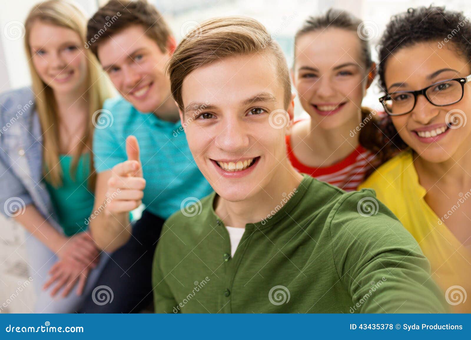 Smiling Students In Mortarboards Stock Photo | CartoonDealer.com #77257584
