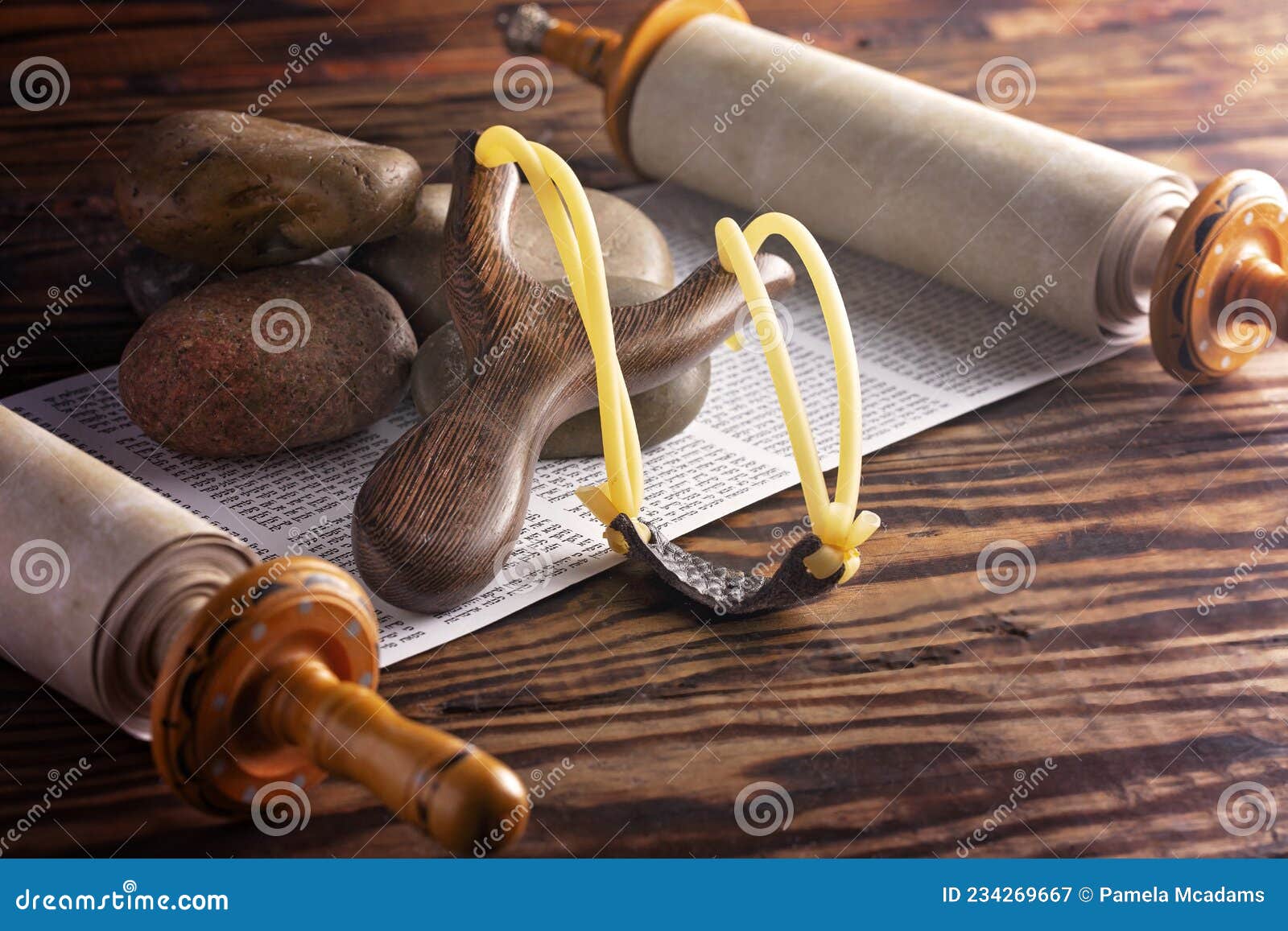 Five Smooth Stones and Sling Shot on a Hebrew Scroll Symbolising the ... Five Smooth Stones and Sling Shot on a Hebrew Scroll Symbolising the ...