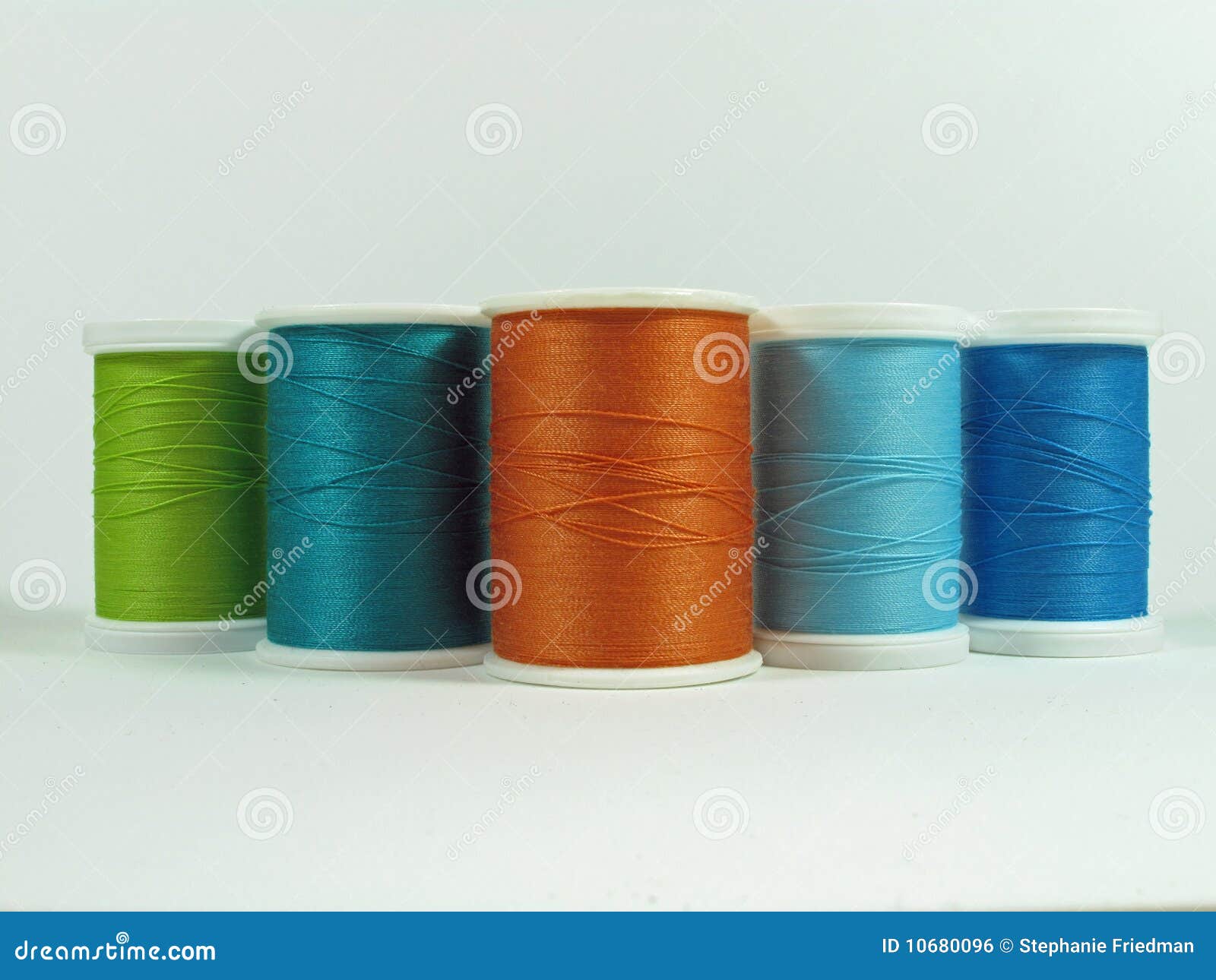 Five Spools of Cotton Thread Stock Photo - Image of abstract, clothing ...