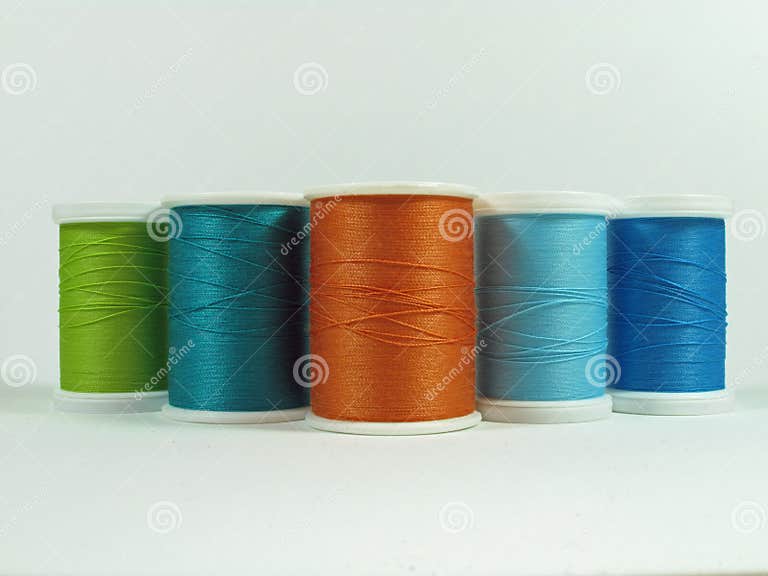 Five Spools of Cotton Thread Stock Photo - Image of abstract, clothing ...