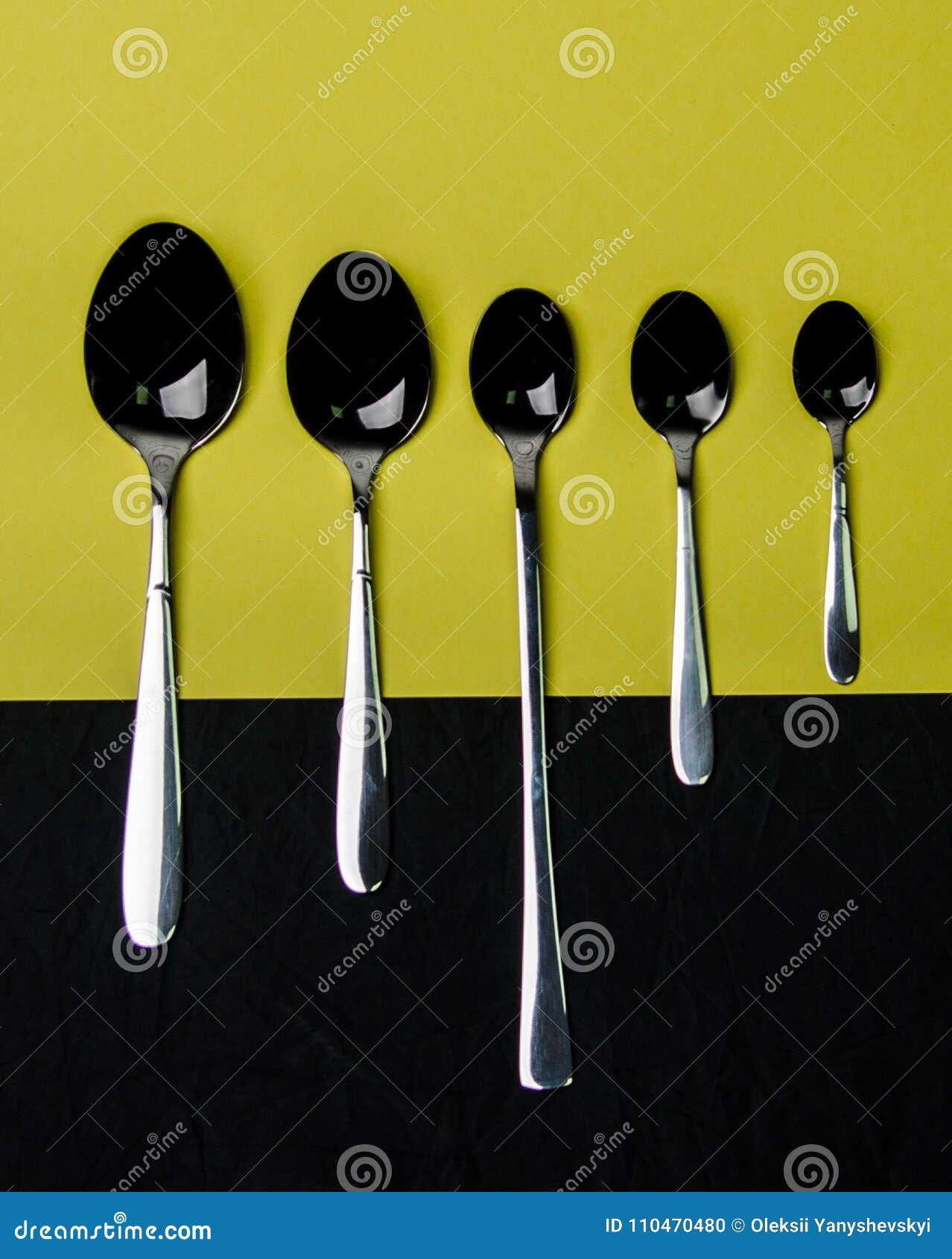 Five Spoons Displaying Various Types Of Creamy Condiments On A Plain ...