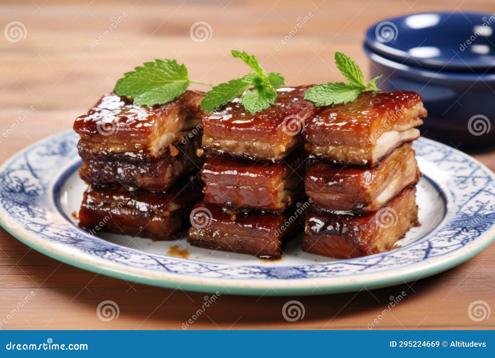 Five Stacked Glazed Pork Ribs on a Porcelain Platter Stock Image ...