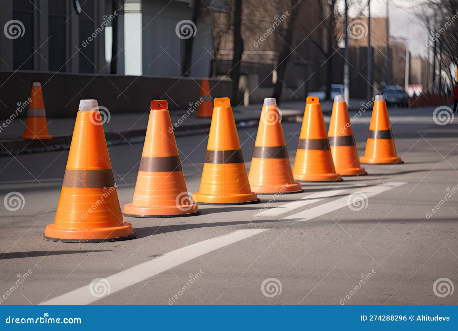Five Traffic Cones in a Row, Creating Safe and Visible Pathway Stock ...