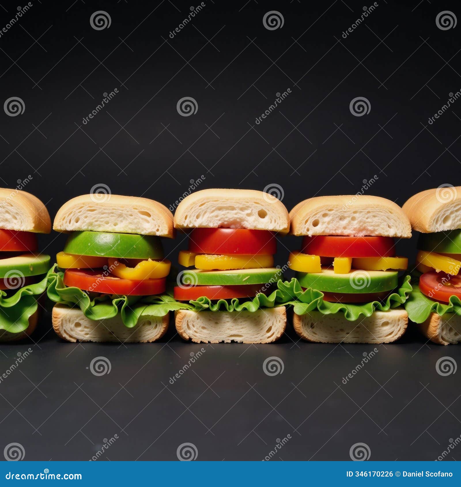 Five Vibrant Veggiefilled Sandwiches Arrayed on a Stark Black Backdrop ...
