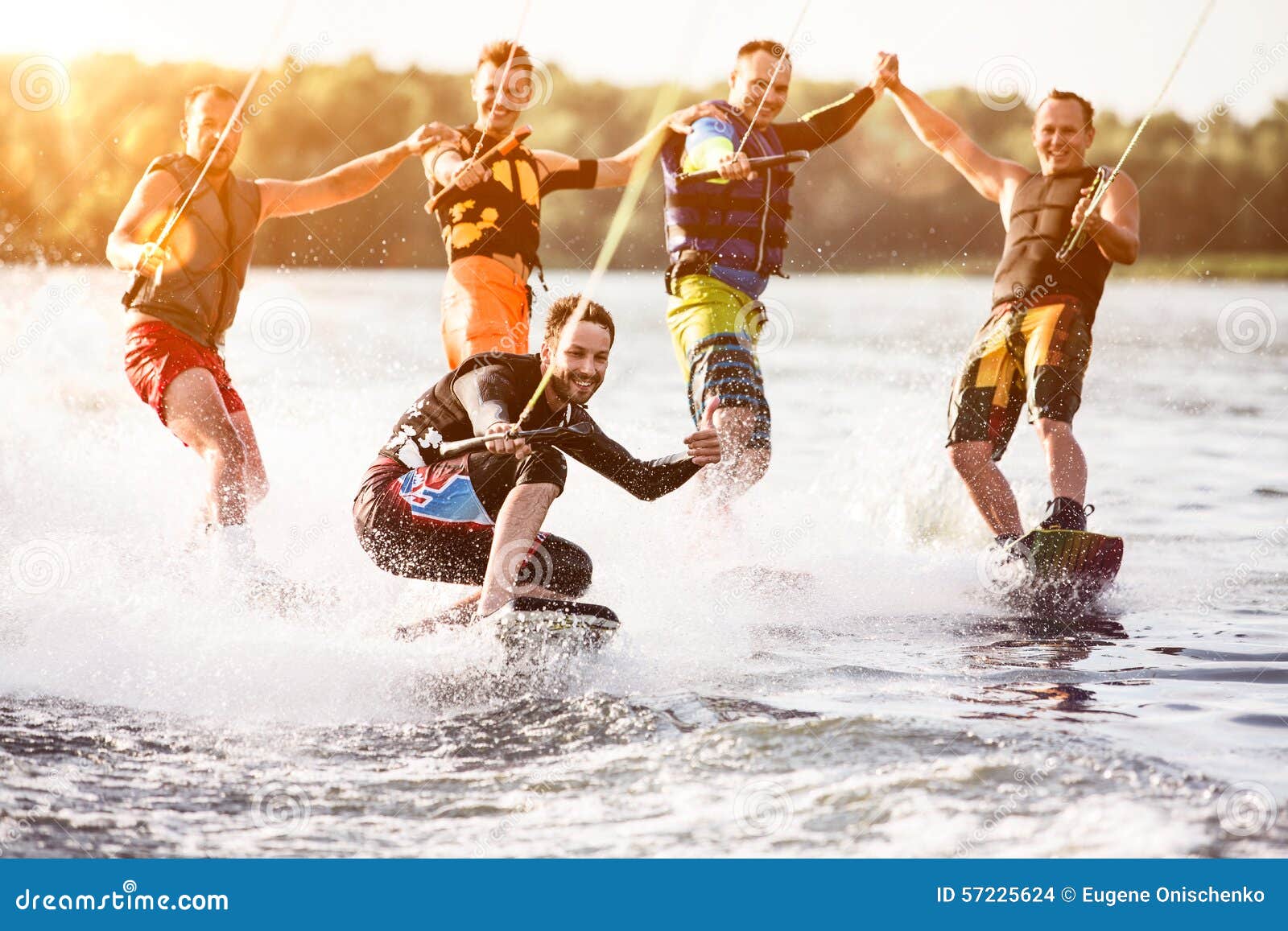 Five Wake Bord Riders Having Fun Stock Photo - Image of multi, handsome ...