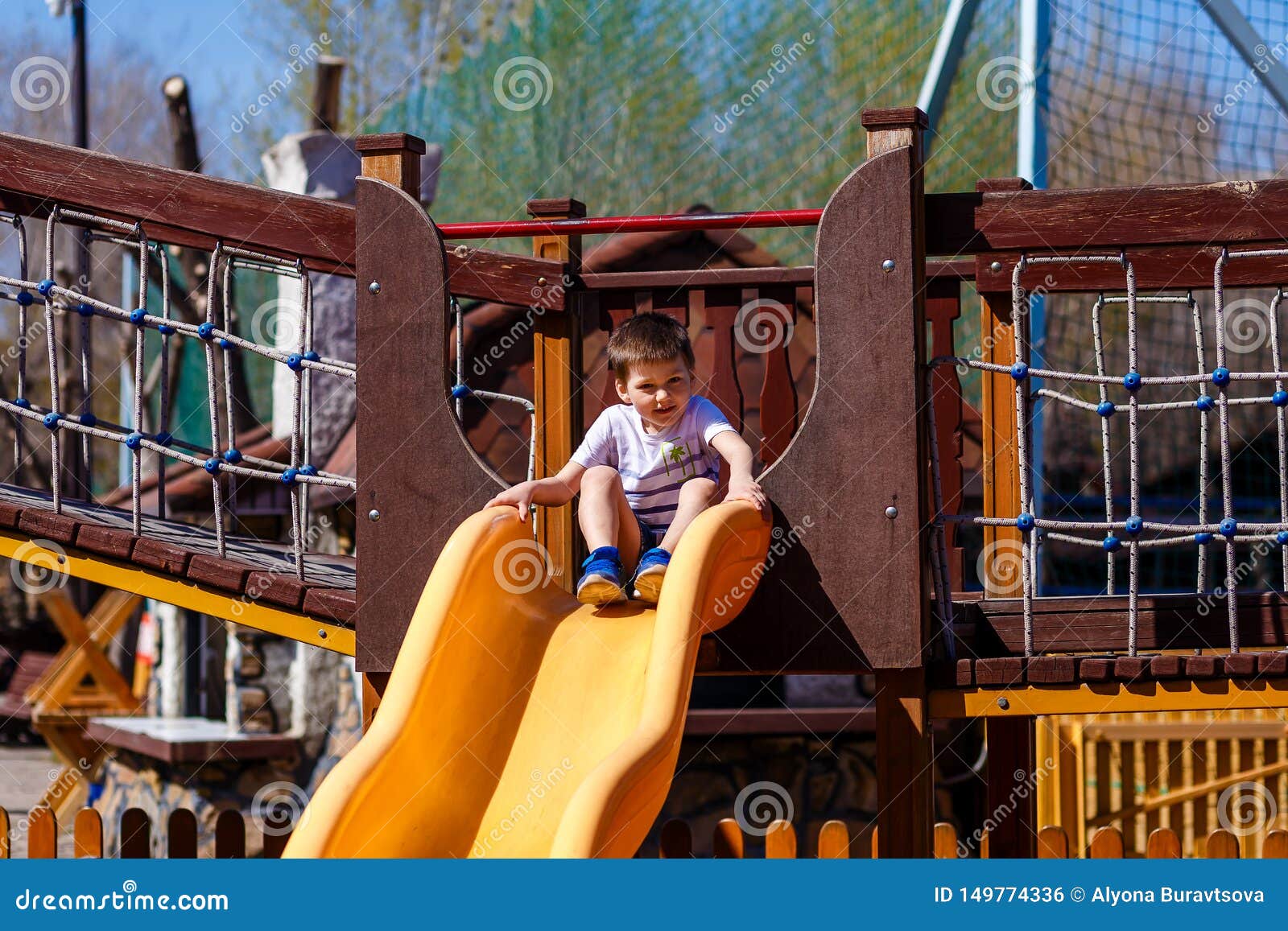 Five Year Old Boy Playing on the Playground Stock Photo - Image of ...