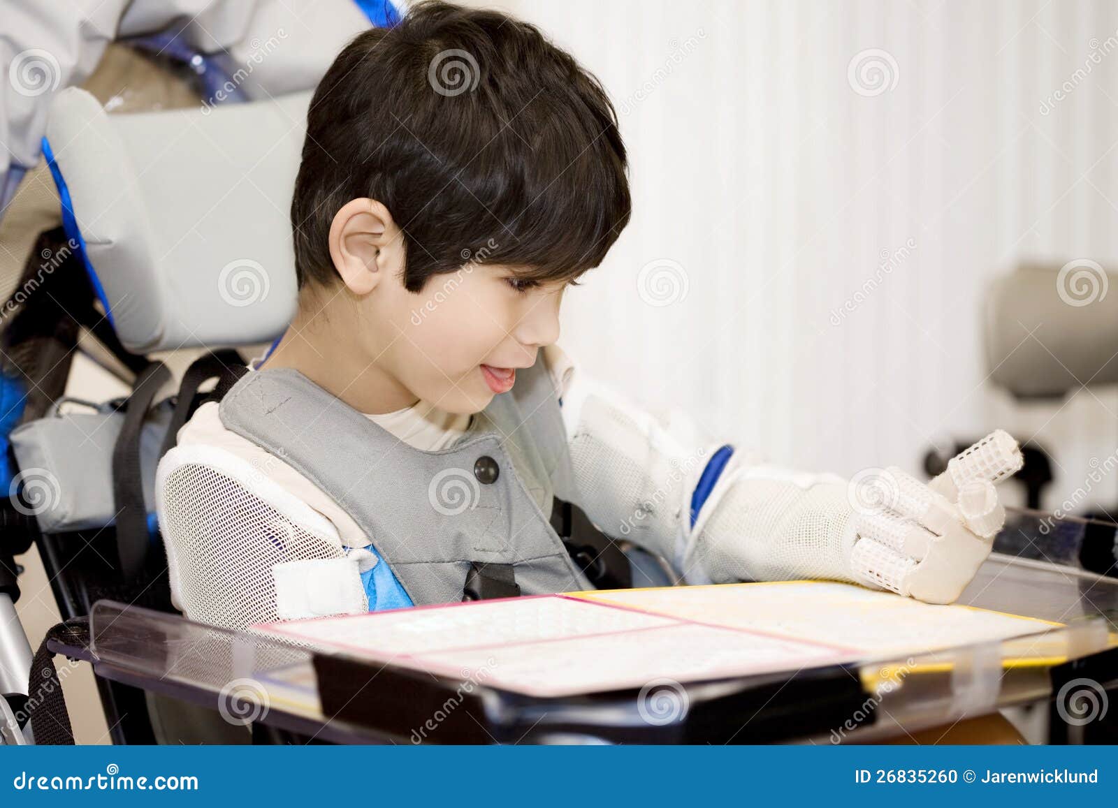 Five Year Old Disabled Boy Studying in Wheelchair Stock Photo - Image ...
