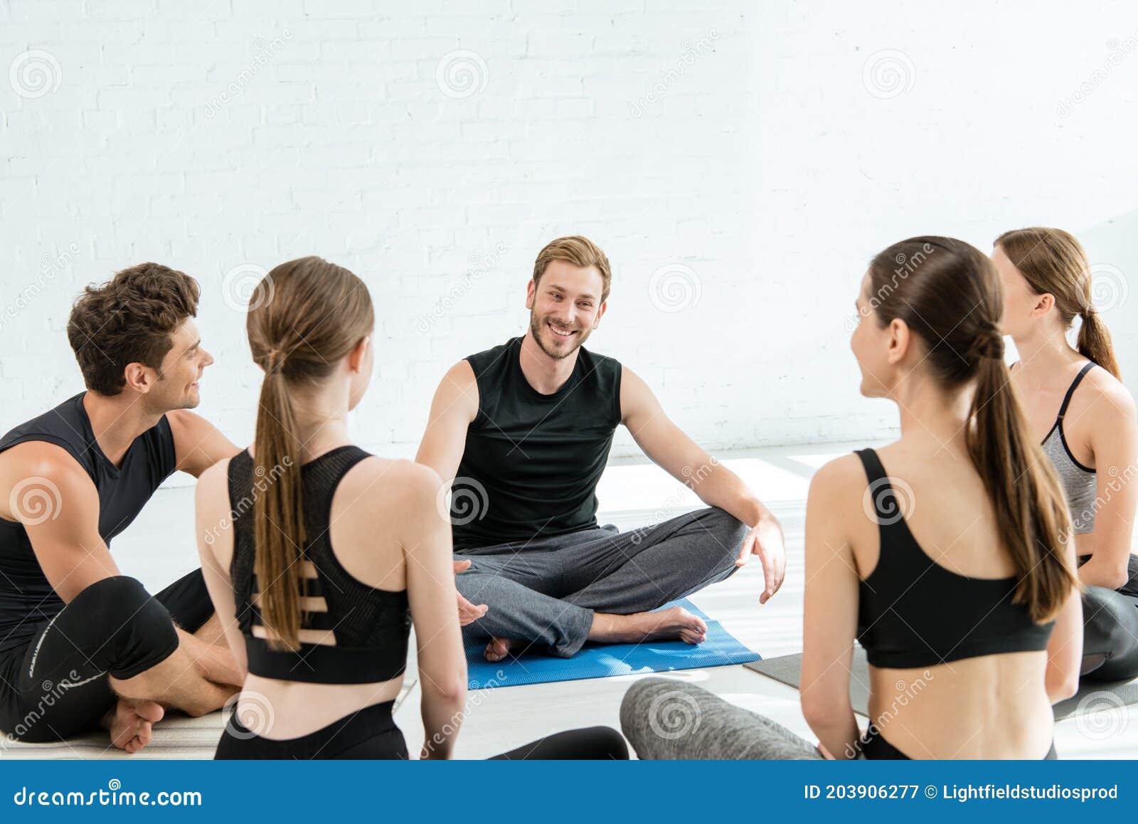 Five Young People Talking and Smiling Stock Image - Image of positive ...