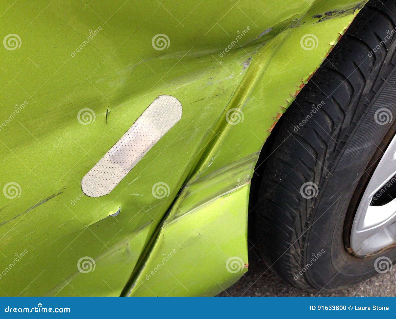 Fixed it stock photo. Image of automobile, dent, tire - 91633800