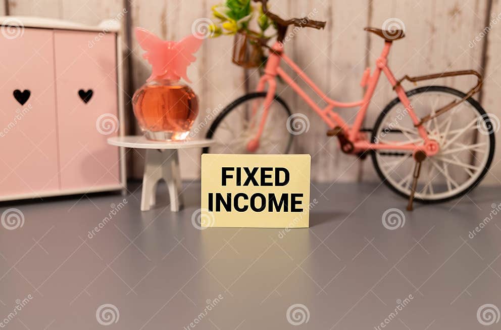 FIXED INCOME Text on Sticker with Pen on the Black Background Stock ...