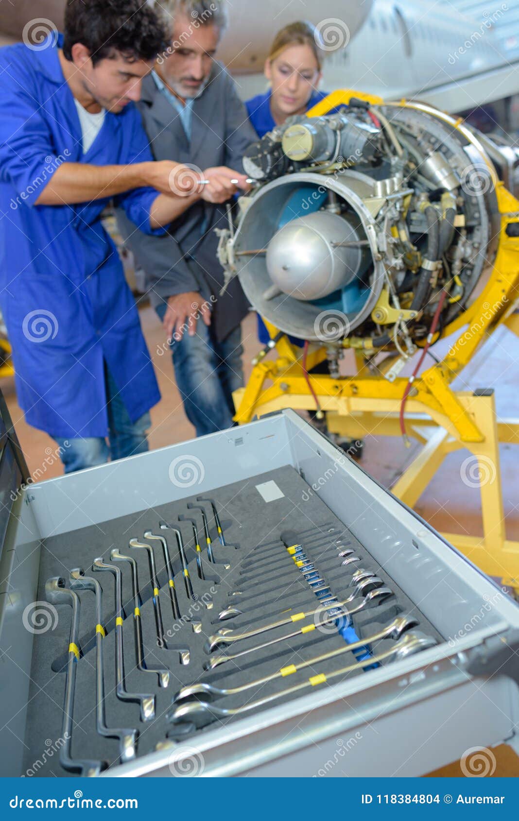 Fixing an airplane part stock photo. Image of future - 118384804