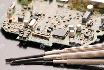 Fixing a Circuit Board stock photo. Image of engineer - 25261070