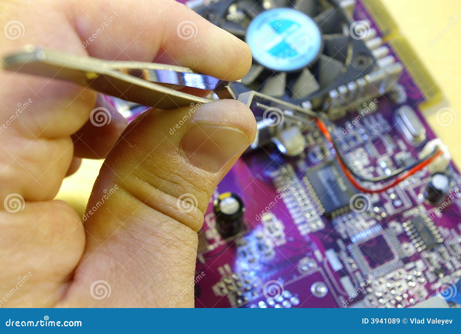 Fixing the computer board stock image. Image of tweezers - 3941089